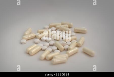 Bunch of pills - tablets and capsules - on white background Stock Photo ...