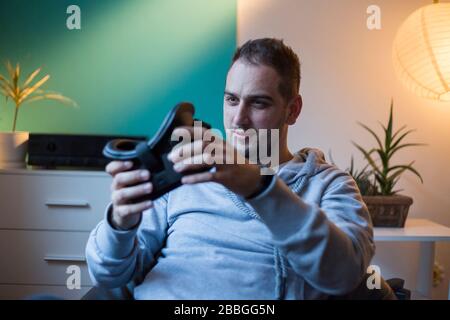 men in lazy bag enjoying vr at home virtual reality googles Stock Photo ...