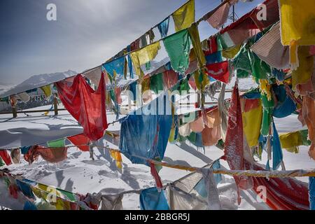 Rope covered in colorful Tibetan Mongolian Buddhist prayer flags Stock ...