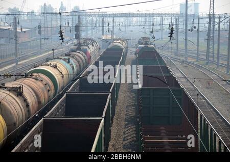 Freight trains on the BAM railway line in the railway sation of ...