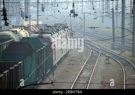 Freight trains on the BAM railway line in the railway sation of ...