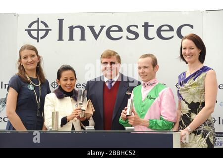 Owner Fitri Hay (left) and jockey Jamie Spencer (right) pick up their ...