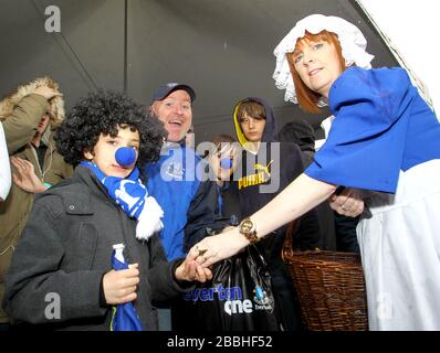 The Everton toffee lady hands out toffees to fans in the stands Stock ...