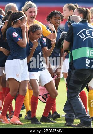 French players celebrate in front of the TV cameras after the final ...