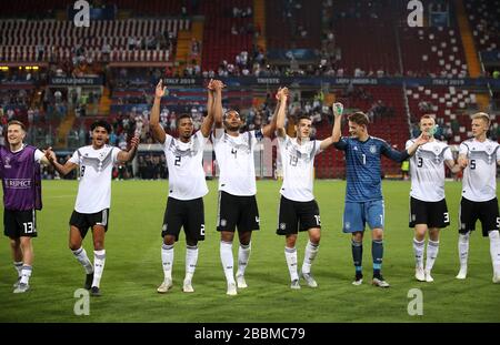 Germany U21's Jonathan Tah (centre) and his team-mates celebrate after ...