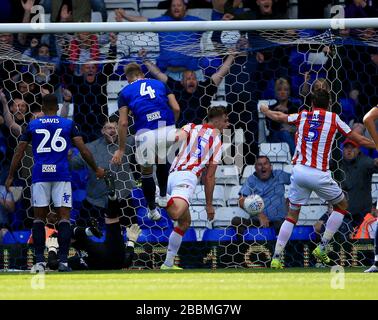 Stoke City's Liam Lindsay (centre) scores his side's first goal of the ...