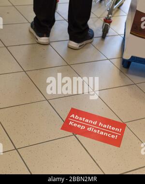 Sign "Keep a distance of 2 m" ("2 m Abstand halten" in German Stock ...