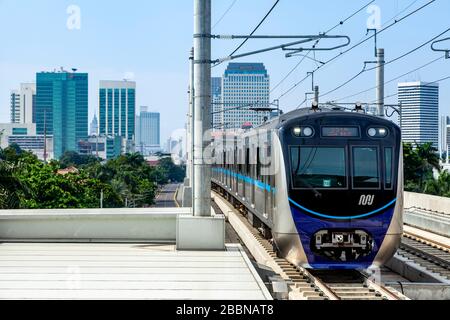 A Metro Train Travelling On The Jakarta Metro (MRT), Jakarta, Indonesia ...
