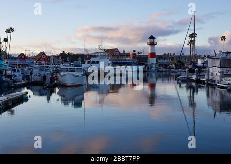 Oceanside harbor, California, boats, lighthouse, dock, green grass and ...