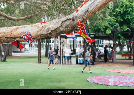 Flags of different countries in the tree. Multicultural network ...