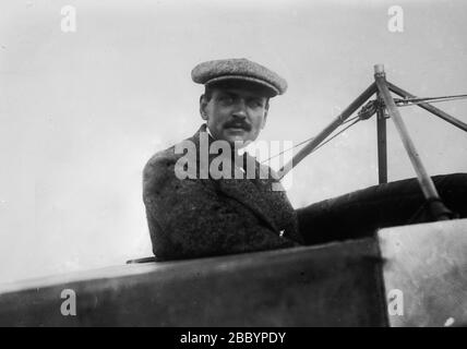 French aviator, Andre Frey (1886-1912) posed in the cockpit of an ...