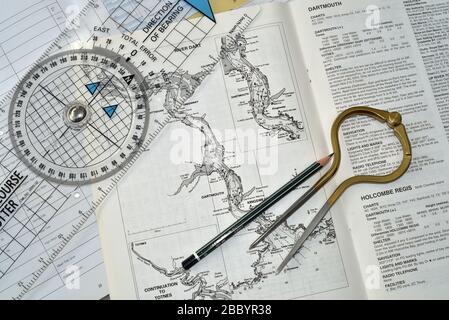 map reading and plotting for boat skippers Stock Photo - Alamy