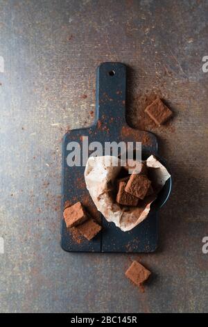 Nougat cubes with cocoa powder Stock Photo - Alamy