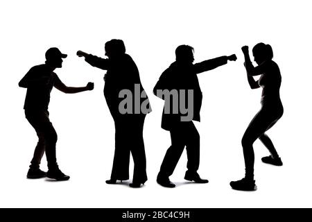 Silhouette of a group of people punching. The crowd is isolated on a ...
