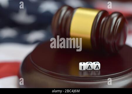 Justice mallet and IAA acronym close up. Immigration and asylum act ...