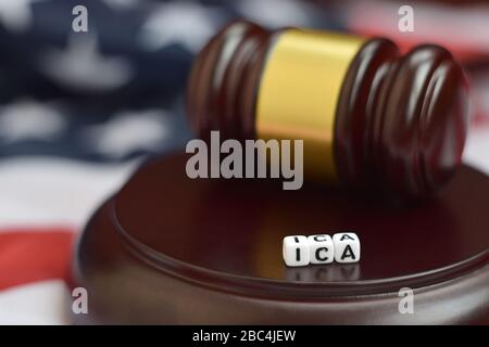 Justice mallet and ICA acronym close up. Congressional budget and ...