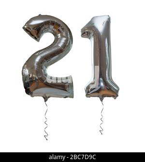 Silver Number Balloons 21 on pink background with bokeh lights. Holiday ...