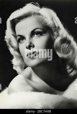 American actress Cleo Moore wearing a black dress, 1950s Stock Photo ...