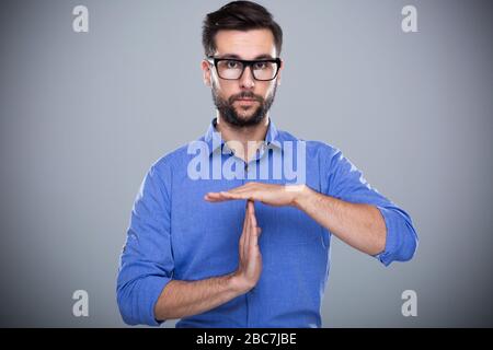 People showing time out gesture on different color backgrounds. Collage ...