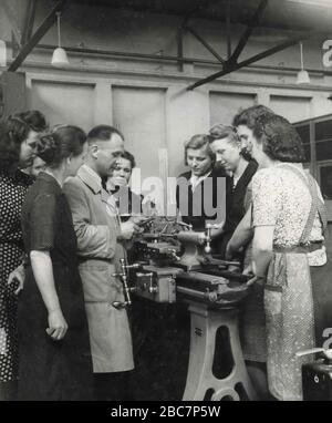German women working at the assembly line, Germany 1930s Stock Photo ...