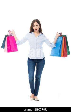 Beautiful caucasian woman holding shopping bags and 500 norwegian krone ...