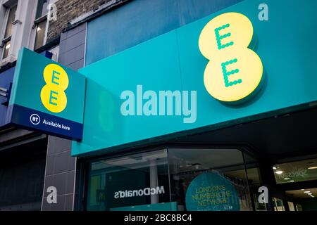 EE Mobile phone network- exterior logo / signage- London Stock Photo ...