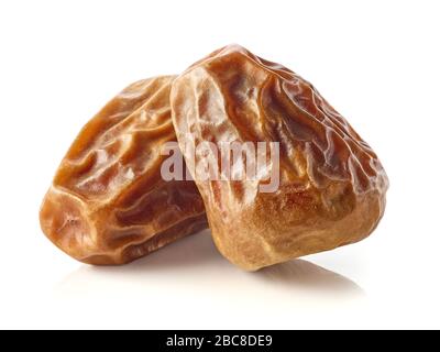 Whole dates isolated on white background Stock Photo - Alamy