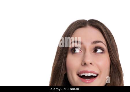 Beautiful young woman looking up outdoors Stock Photo - Alamy