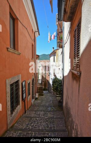 A narrow street between the houses of Scapoli, a village in the Molise ...