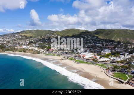 A coastal view of Laguna Beach California with vibrant red Aloe Vera ...
