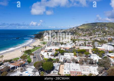A coastal view of Laguna Beach California with vibrant red Aloe Vera ...