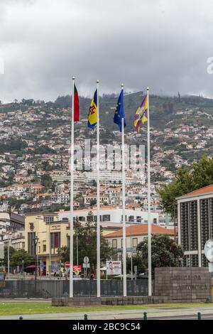 Flags of Portugal, Madeira, the European Union and Funchal against the ...