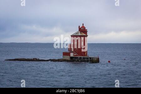 Very old octagon lighthouse Kjeungskjær Fyr in the Norwegian Sea Stock ...