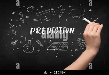 Hand drawing PREDICTION inscription with white chalk on blackboard ...