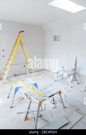 Construction of new home interior drywall installation and finish ...