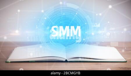 Open book with SMM abbreviation, modern technology concept Stock Photo ...