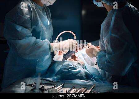 Close-up Shot in the Operating Room of Surgical Table with Instruments ...