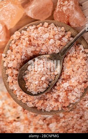 Top view of Close up of Himalayan Pink Salt Crystals in a Glass Bottle ...