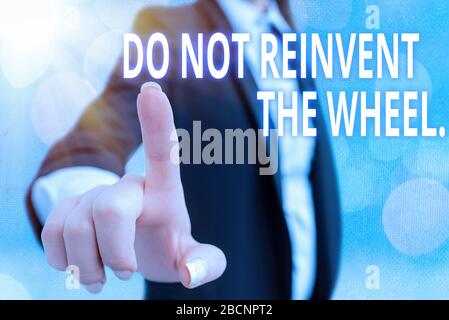 Writing note showing Do Not Reinvent The Wheel. Business concept for ...