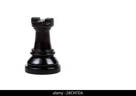 black chess Rook piece on the chessboard Stock Photo: 222970974 - Alamy