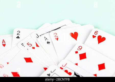 Playing cards scattered face up on a surface Stock Photo - Alamy