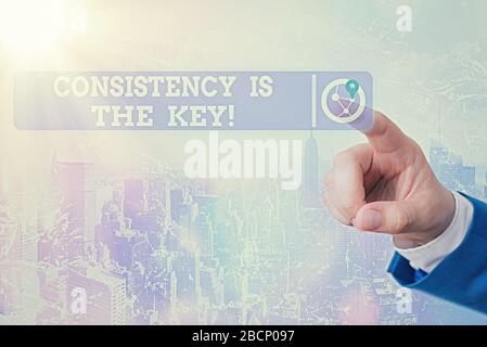 Writing note showing Consistency Is The Key. Business concept for by ...
