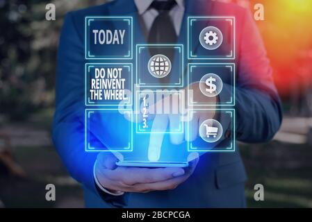 Writing note showing Do Not Reinvent The Wheel. Business concept for ...