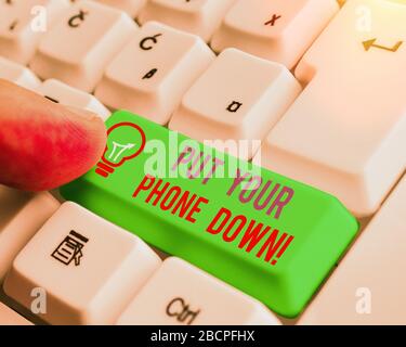 Writing note showing Put Your Phone Down. Business concept for end ...