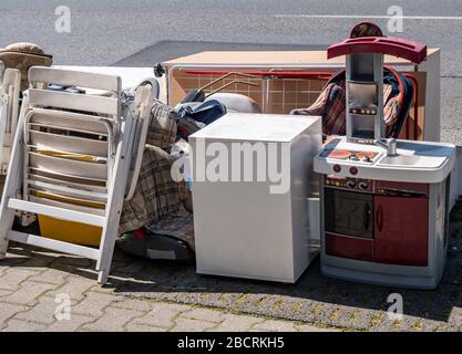 Bulky waste on the roadside Stock Photo - Alamy