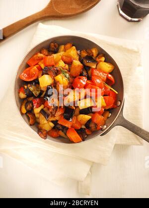 Traditional calabrian recipe Ciambotta, potatoes, tomatoes, peppers and ...