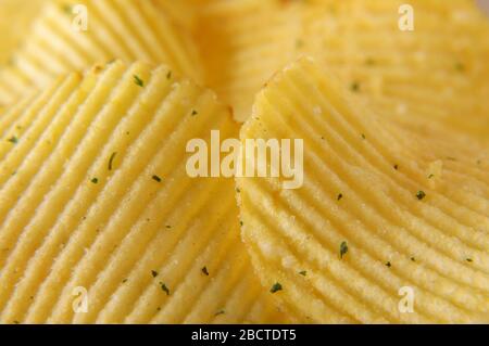 Wavy potato chips abstract texture pattern macro close up Stock Photo ...