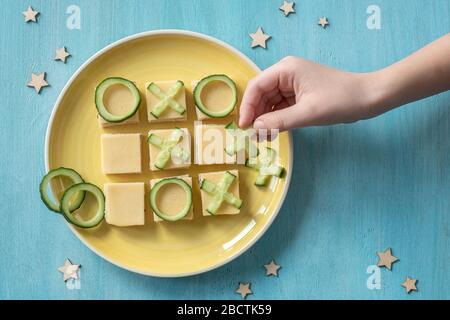 Tic tac toe sandwich. Fresh bread, cheese and cucumber Stock Photo - Alamy