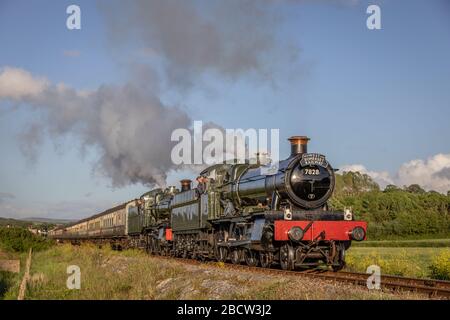 Steam locomotive 7828 Odney Manor pulling the 'Winter Lights' Christmas special passenger train ...