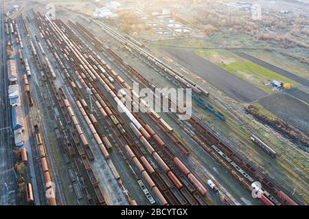 Aerial view of various railway carriage trains with goods on the ...